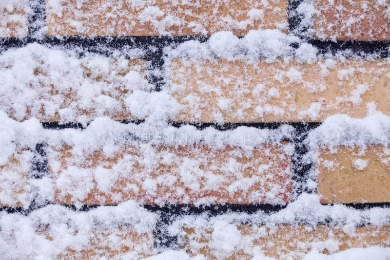 Close Up on Snow on Yellow Brick Wall Stock Image - Image of winter ...