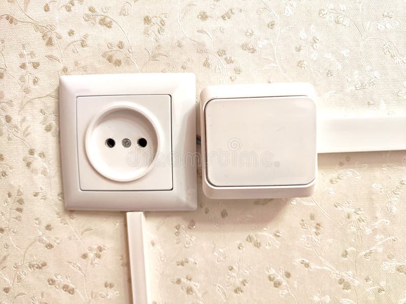 Close-up of a Socket and Switch on a Decorative Wall. European Wall ...
