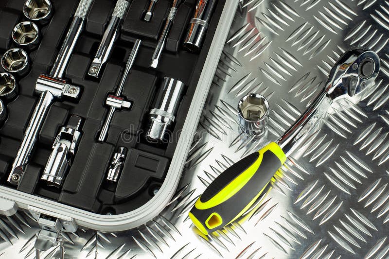 Socket Wrench Set with Tools on Metal Surface Stock Illustration ...