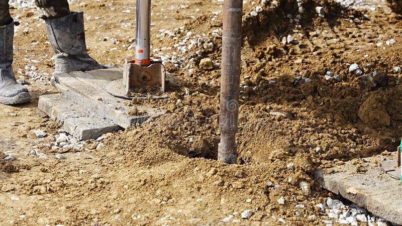 Close-up of Soil Sampling during Pile Drilling Process. Extraction of ...