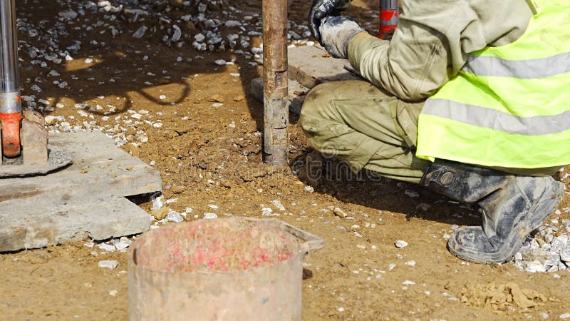 Close-up of Soil Sampling during Pile Drilling Process. Extraction of ...