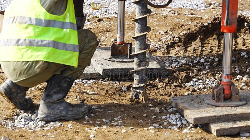 Close-up of Soil Sampling during Pile Drilling Process. Extraction of ...