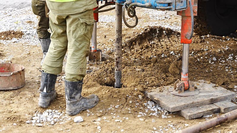 Close-up of Soil Sampling during Pile Drilling Process. Extraction of ...