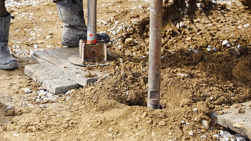 Close-up of Soil Sampling during Pile Drilling Process. Extraction of ...