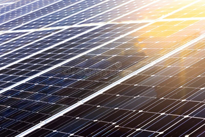 A Close Up of a Solar Panel with a Sun Shining on it Stock Image ...