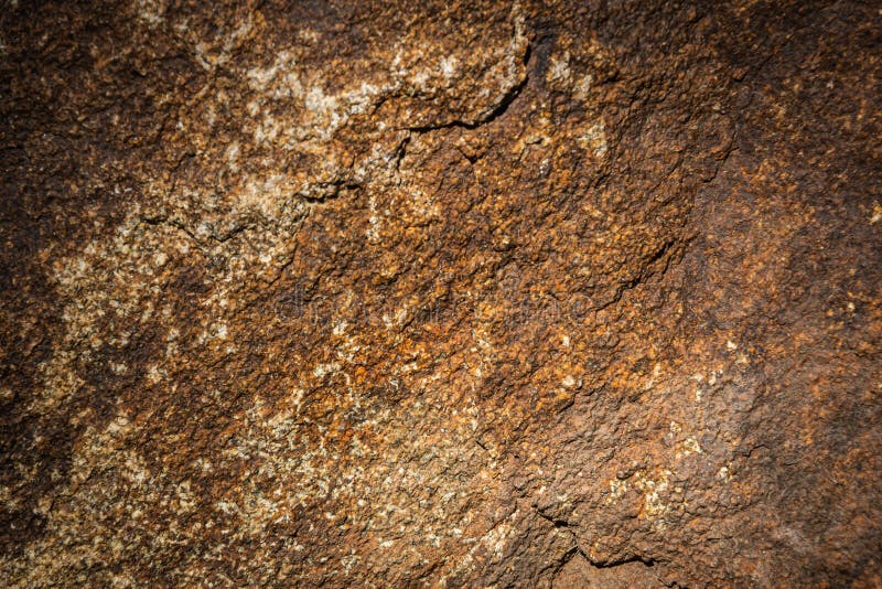 Close Up of a Solid Granite Rock in a Variety of Yellow and Brown ...