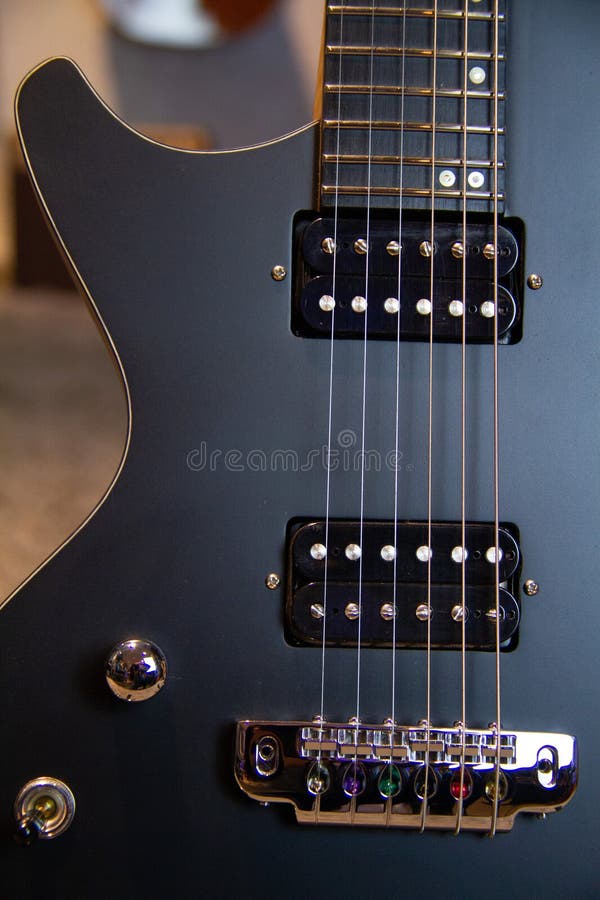 Close Up of a Solid Matte Black Electric Guitar Stock Photo - Image of ...