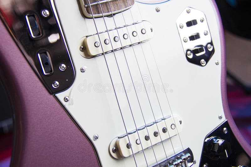 Close Up of Solid Pink Jaguar Style Electric Guitar Stock Photo - Image ...