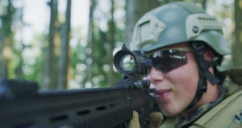 Close Up of Solider Using Assault Rifle while Protecting Military Base ...