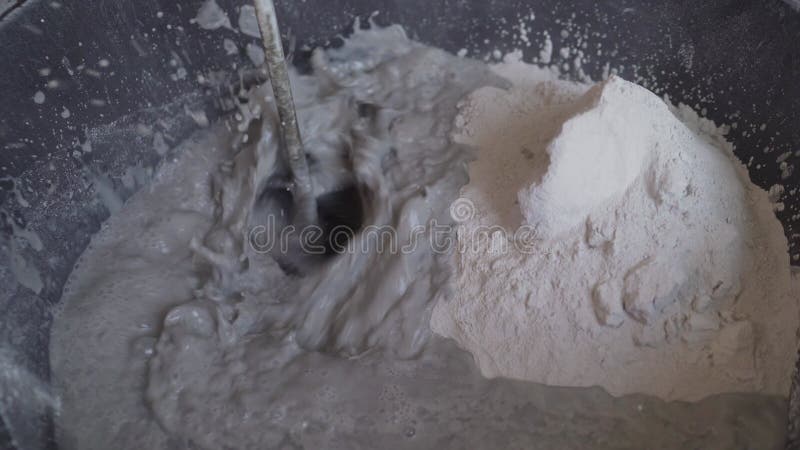 Preparation of Cement Mix for Use in Tile Laying. a Close-up of a ...