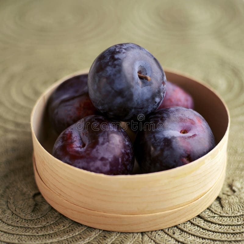 Close Up of Some Plums in a Container. Conceptual Image Stock Image ...