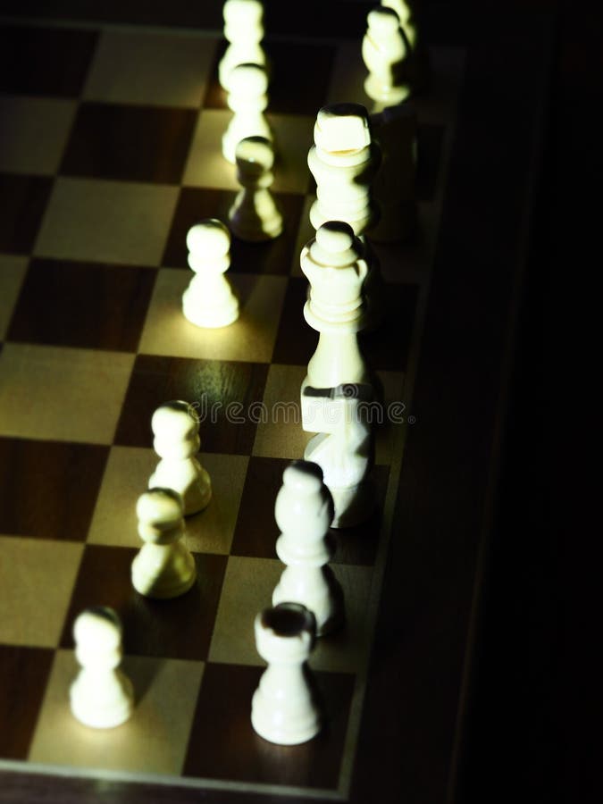 Dramatically Lit Chess Pieces on a Board Stock Image - Image of ...