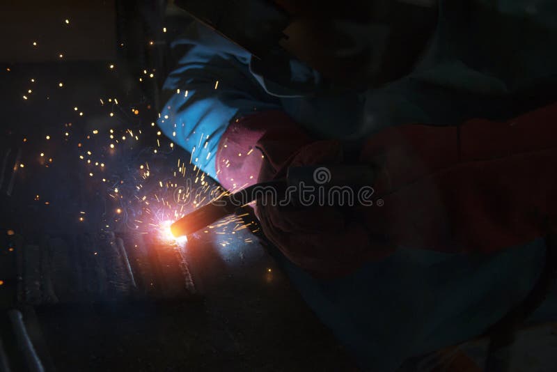 The Sparking Light from the Arc Welding Process Stock Image - Image of ...