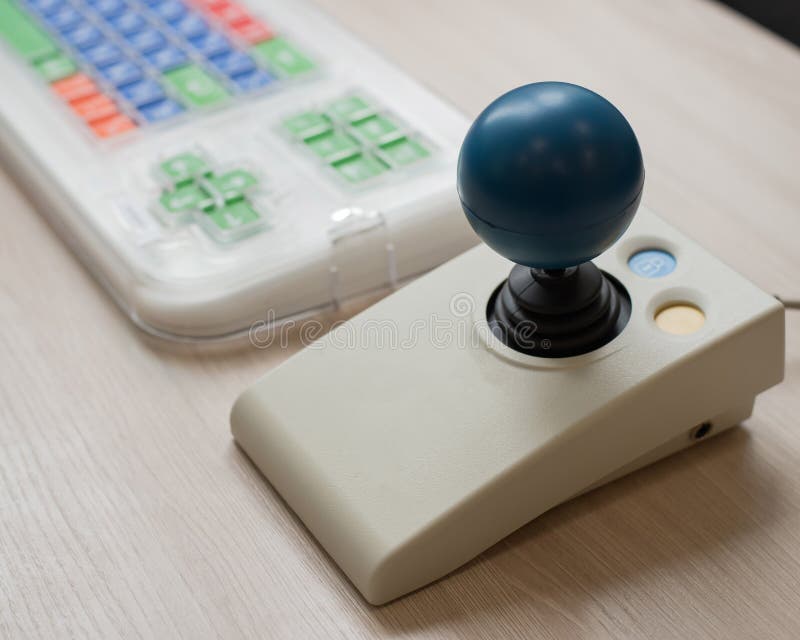 Close-up of a Specialized Computer Mouse and Keyboard for People with ...