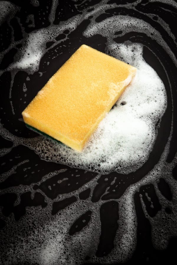 Close Up of Sponge with Soap on Dark Surface Stock Image - Image of ...