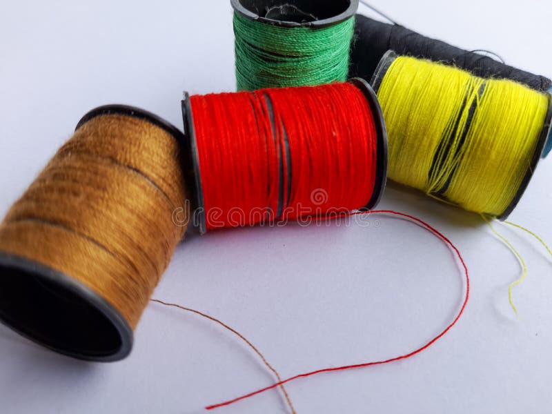 Close Up of a Spool of Sewing Equipment Thread with White Background ...
