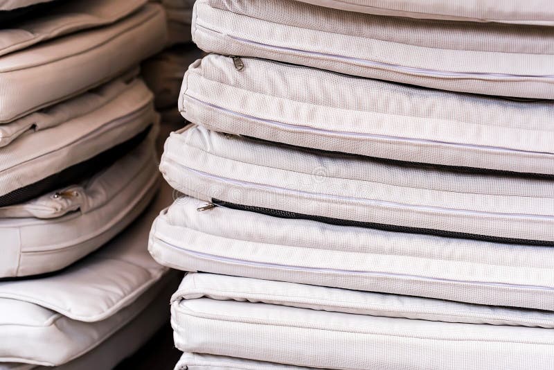 Stack of White Seat Pads in Restaurant Stock Photo - Image of domestic ...