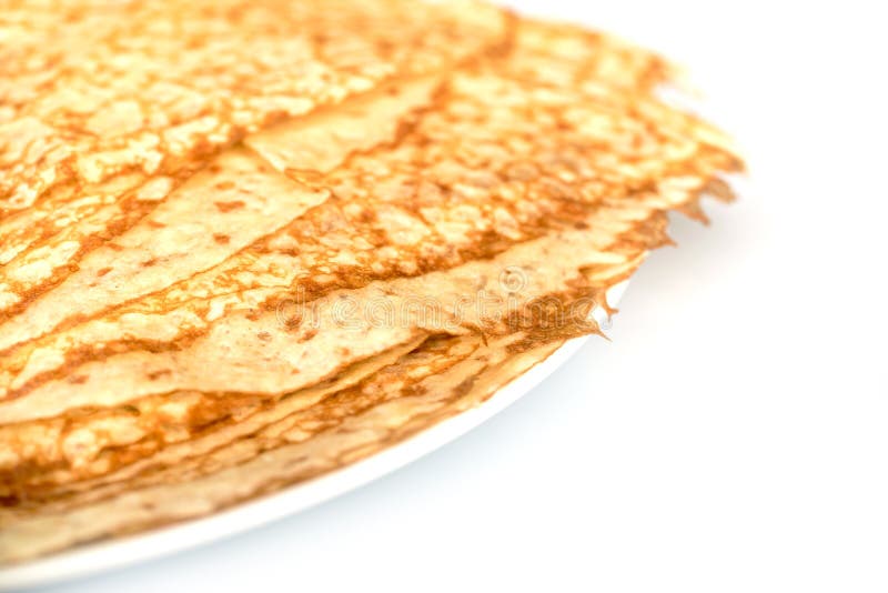 Pancakes in Plate, Spoon with Condensed Milk on Pancake in Saucer ...