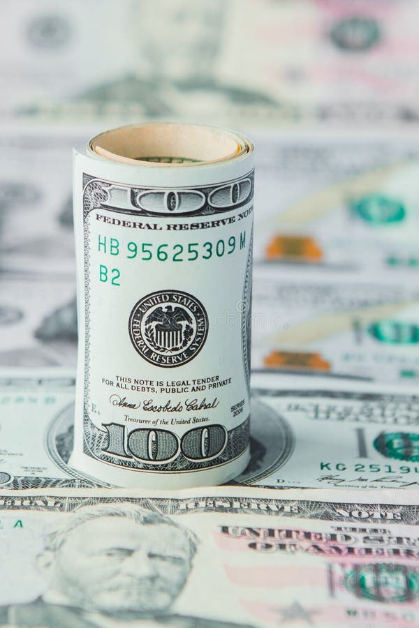 Close-up of Stack of Dollars Against the Backdrop of Money Stock Image ...