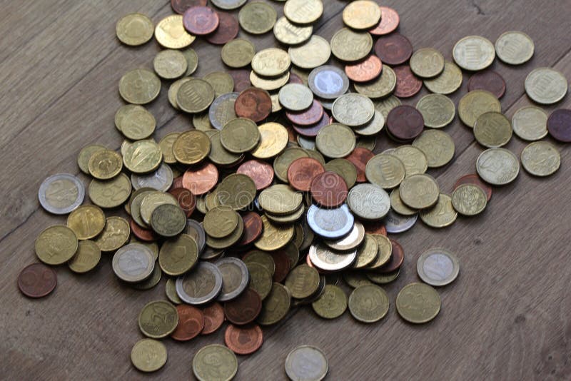 Stack of Euro Coins on Wooden Background Stock Photo - Image of bank ...