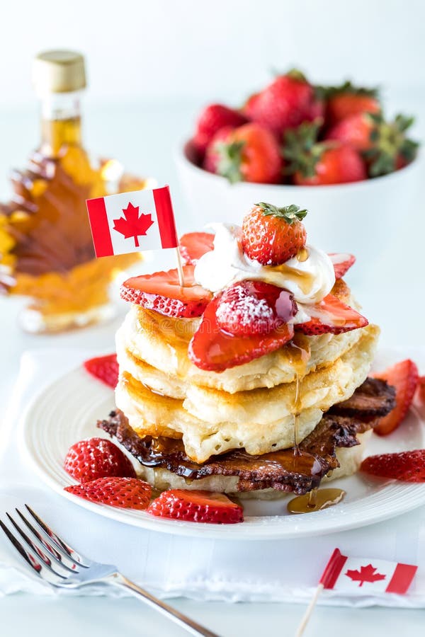 Close Up of a Stack of Pancakes with Strawberries and Maple Syrup for ...