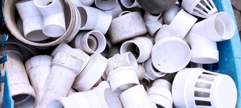 Close Up of Stack of White PVC Pipe in a Warehouse Stock Photo - Image ...