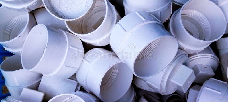 Close Up of Stack of White PVC Pipe in a Warehouse Stock Image - Image ...