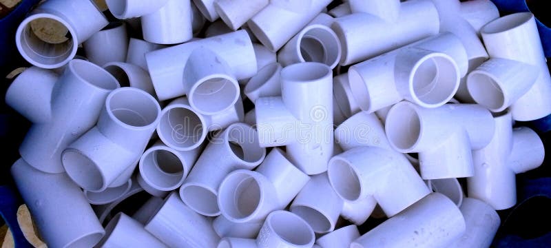 Close Up of Stack of White PVC Pipe in a Warehouse Stock Photo - Image ...
