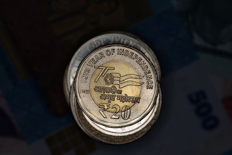 Close-up of Stacked Indian Rupee Coins with a 20 Rupee Coin on Top ...