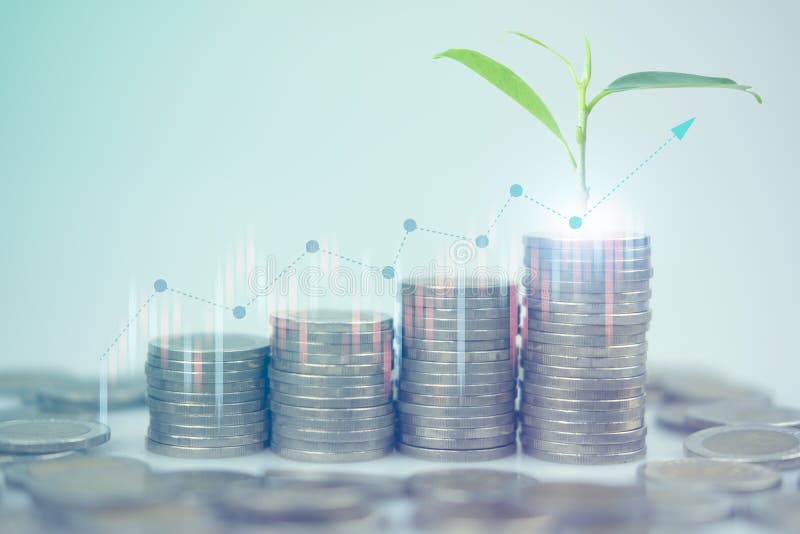 Close Up of Stacking Coins with Virtual Screen Graph and Plant Growing ...