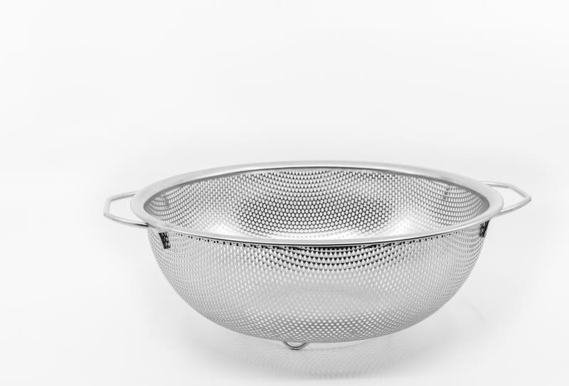 Close-up Stainless Steel Colander with Legs on White Background. Empty ...
