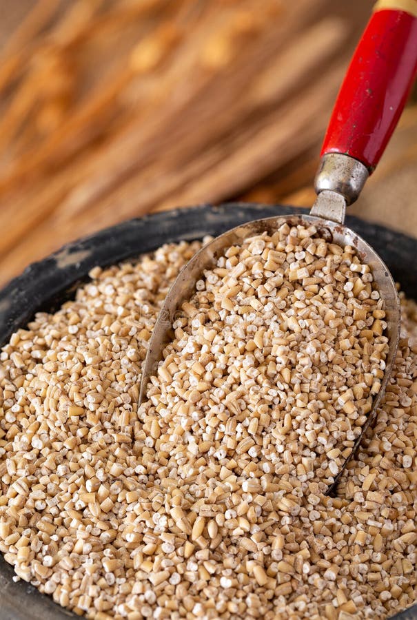 Raw Steel Cut Oats in a Blue Earthenware Bowl on Burlap Fabric Stock ...