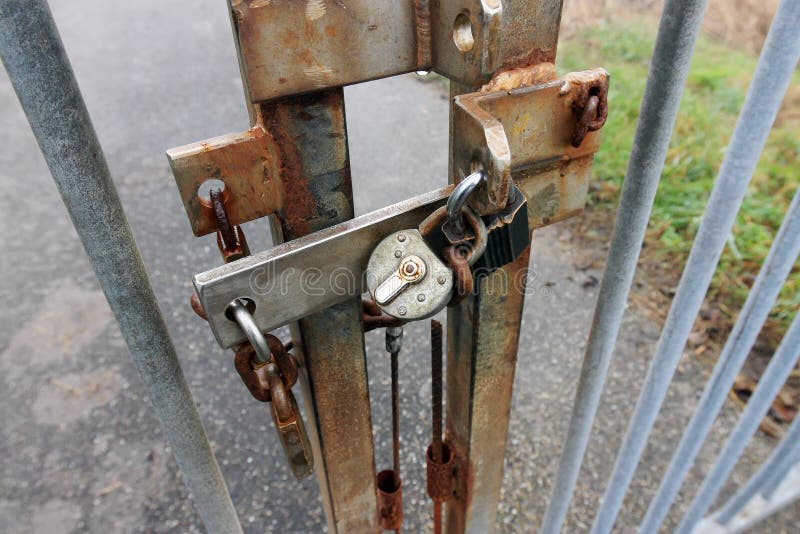 Close-up of Steel Gate and Three Padlocks Stock Photo - Image of gate ...