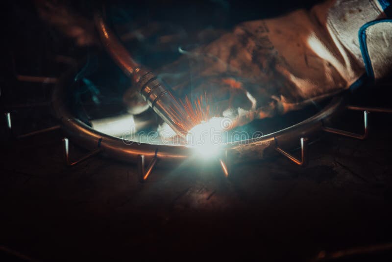 Close Up of the Steel Welding Process. Work in the Heavy Steel Industry ...