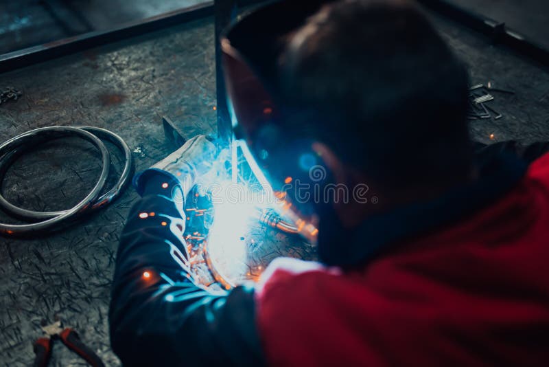 Close Up of the Steel Welding Process. Work in the Heavy Steel Industry ...