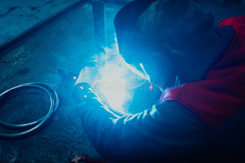 Close Up of the Steel Welding Process. Work in the Heavy Steel Industry ...