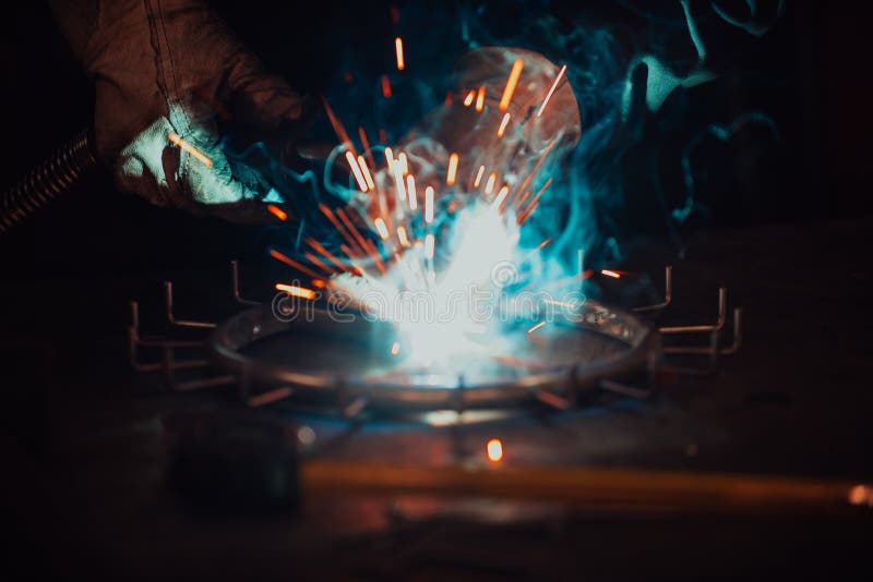 Close Up of the Steel Welding Process. Work in the Heavy Steel Industry ...