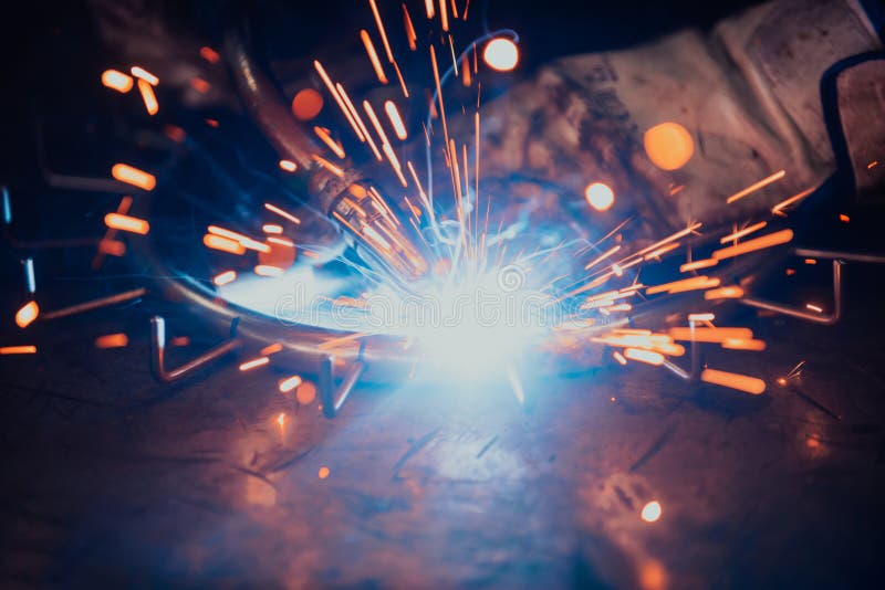 Close Up of the Steel Welding Process. Work in the Heavy Steel Industry ...