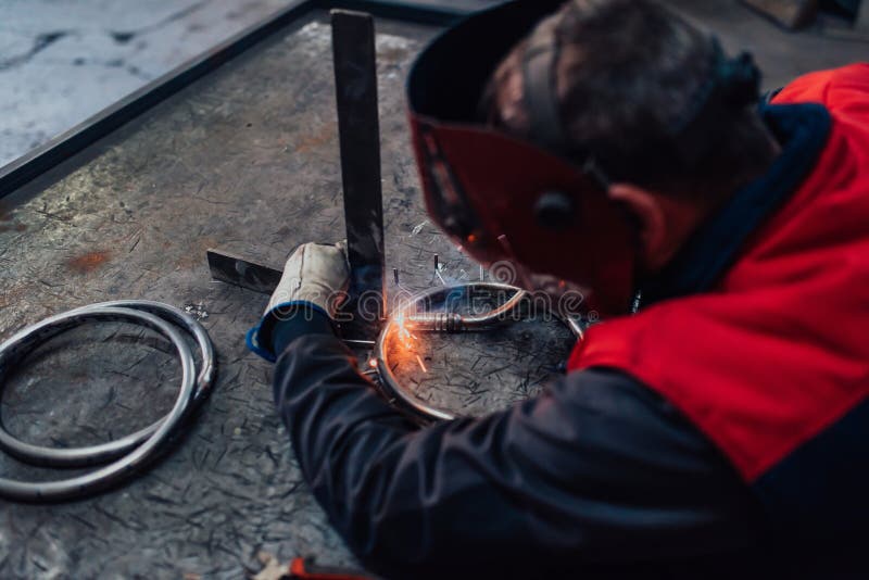 Close Up of the Steel Welding Process. Work in the Heavy Steel Industry ...