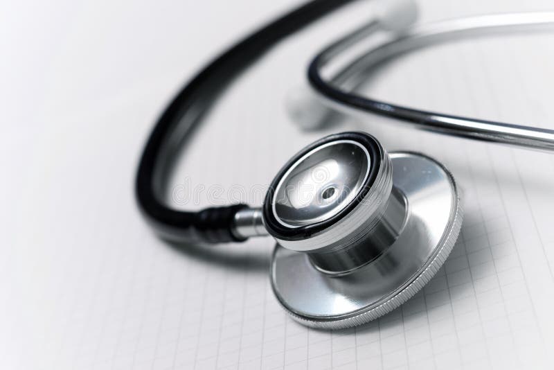 Stethoscope on graph paper stock image. Image of cardiogram - 177791773