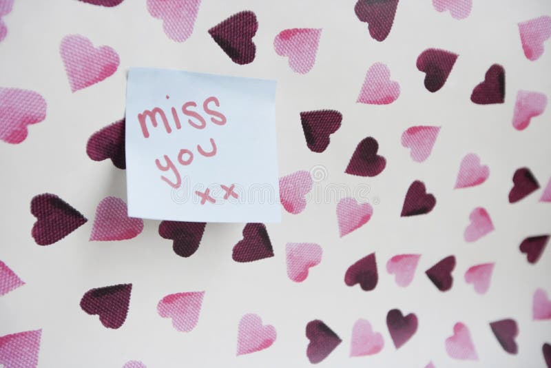 Close-up of Sticky Note with a Message Over Heart Shaped Wall Stock ...