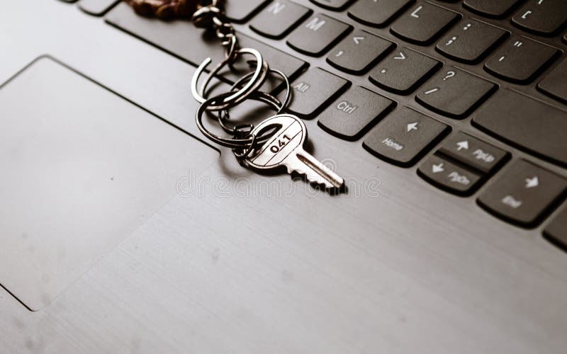 Close Up of Still Life of Key Ring on Laptop Computer Keyboard ...