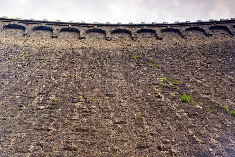 Close up on stone dam wall stock image. Image of brick - 77422621