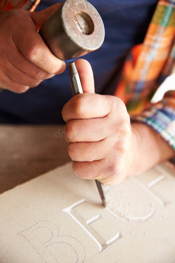 Stone Mason Chiseling a Block of Stone Stock Image - Image of ...
