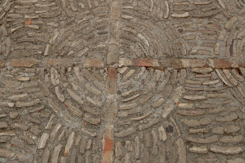Close-up of a Stone Pavement Featuring a Circular Brick Pattern ...