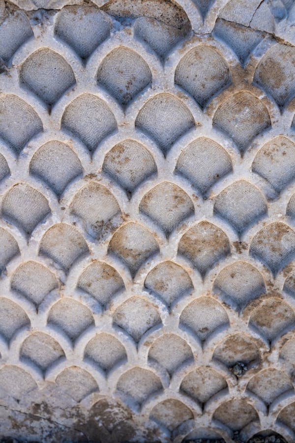 The Close-up of a Stone Surface Reveals a Regular Pattern Resembling ...