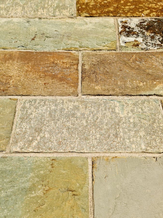 Colorful Stone Wall Showing Different Textures and Colors Creating an ...