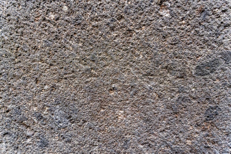 A Close Up of a Stone Wall with a Rough Texture Stock Photo - Image of ...