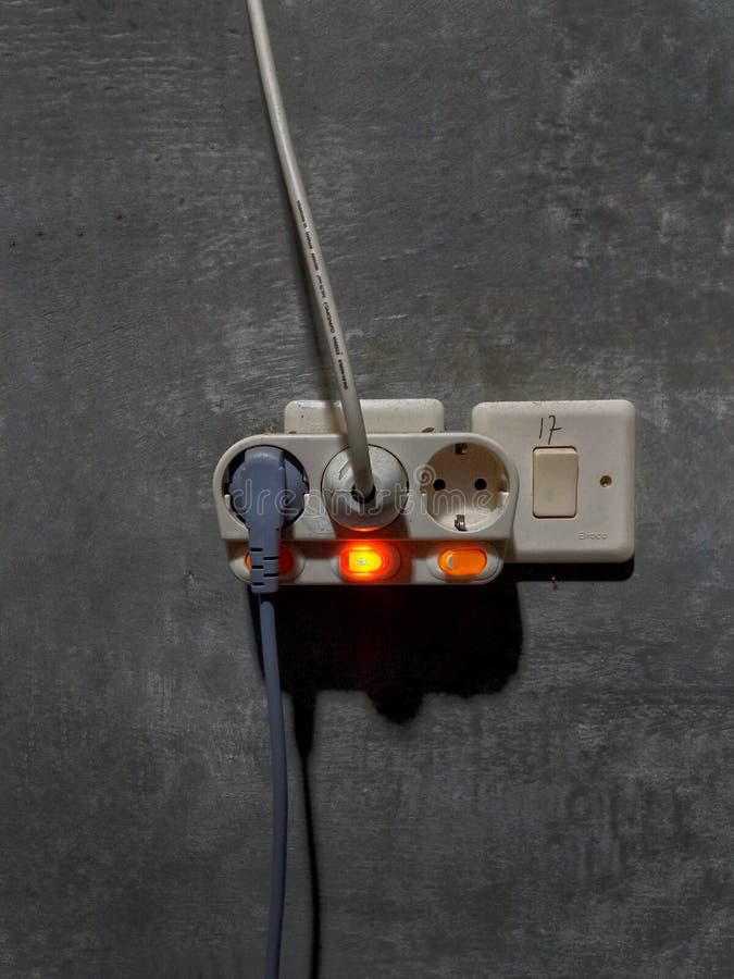 Electrical Socket and Plug on Black Wall * Stock Photo - Image of ...