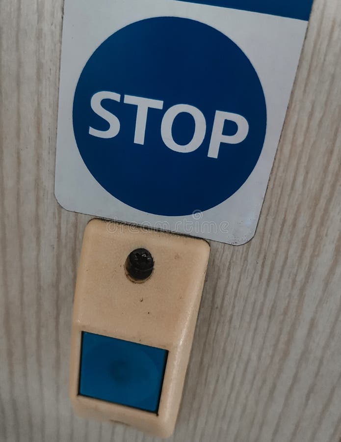 Close-up of a Stop Sign Sticker and a Blue Push Button on a Panel Stock ...